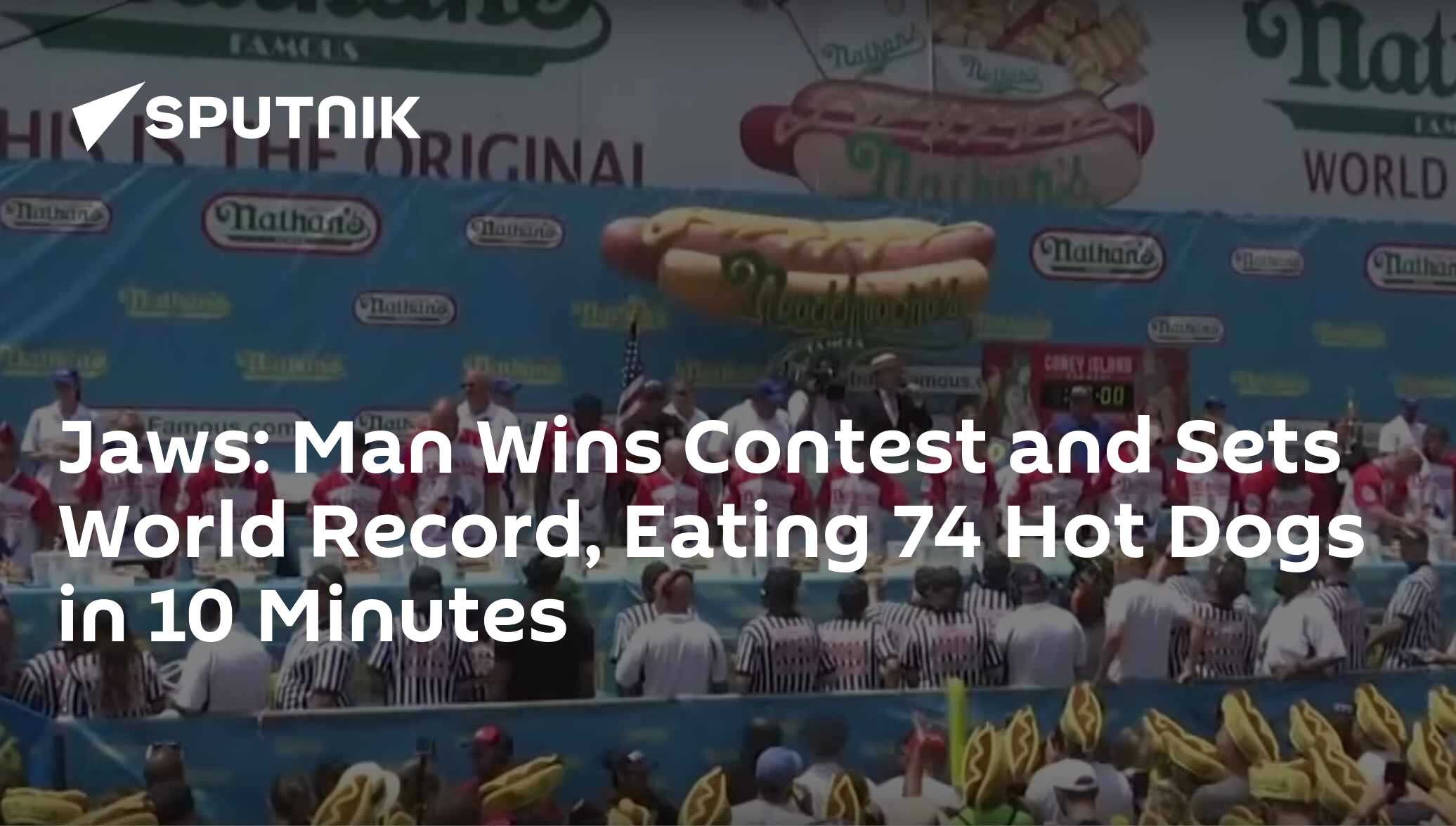 Jaws: Man Wins Contest and Sets World Record, Eating 74 Hot Dogs in 10 ...