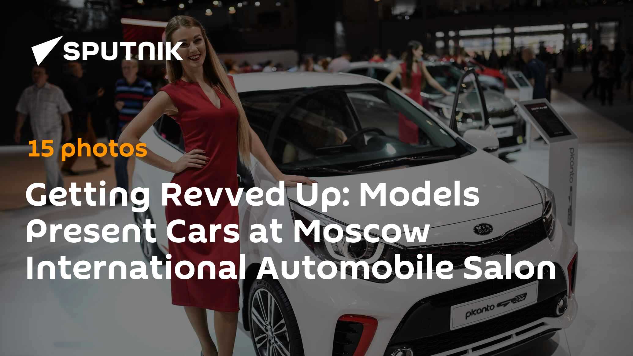 Getting Revved Up: Models Present Cars at Moscow International ...