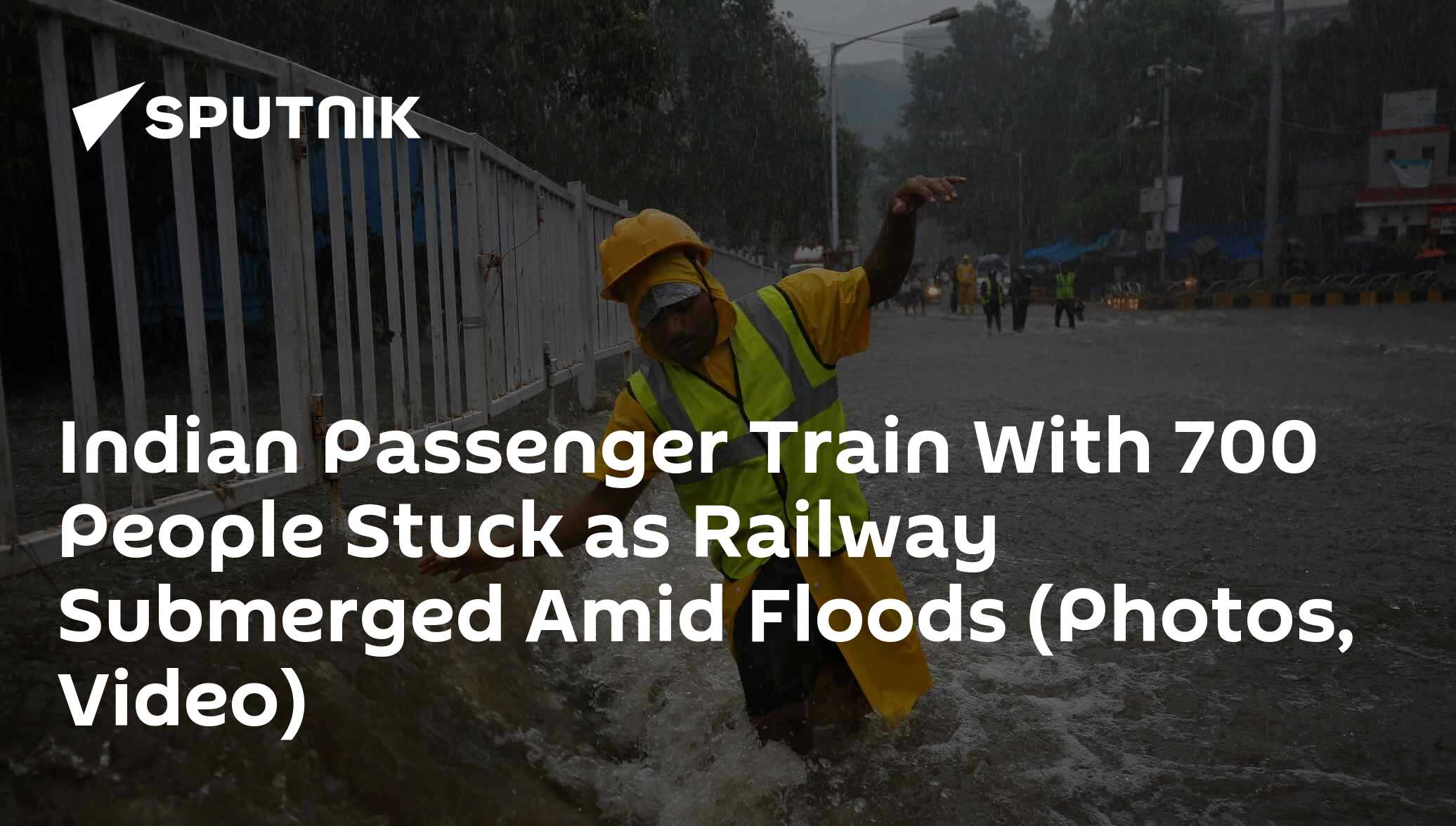 Indian Passenger Train With 700 People Stuck as Railway Submerged Amid ...
