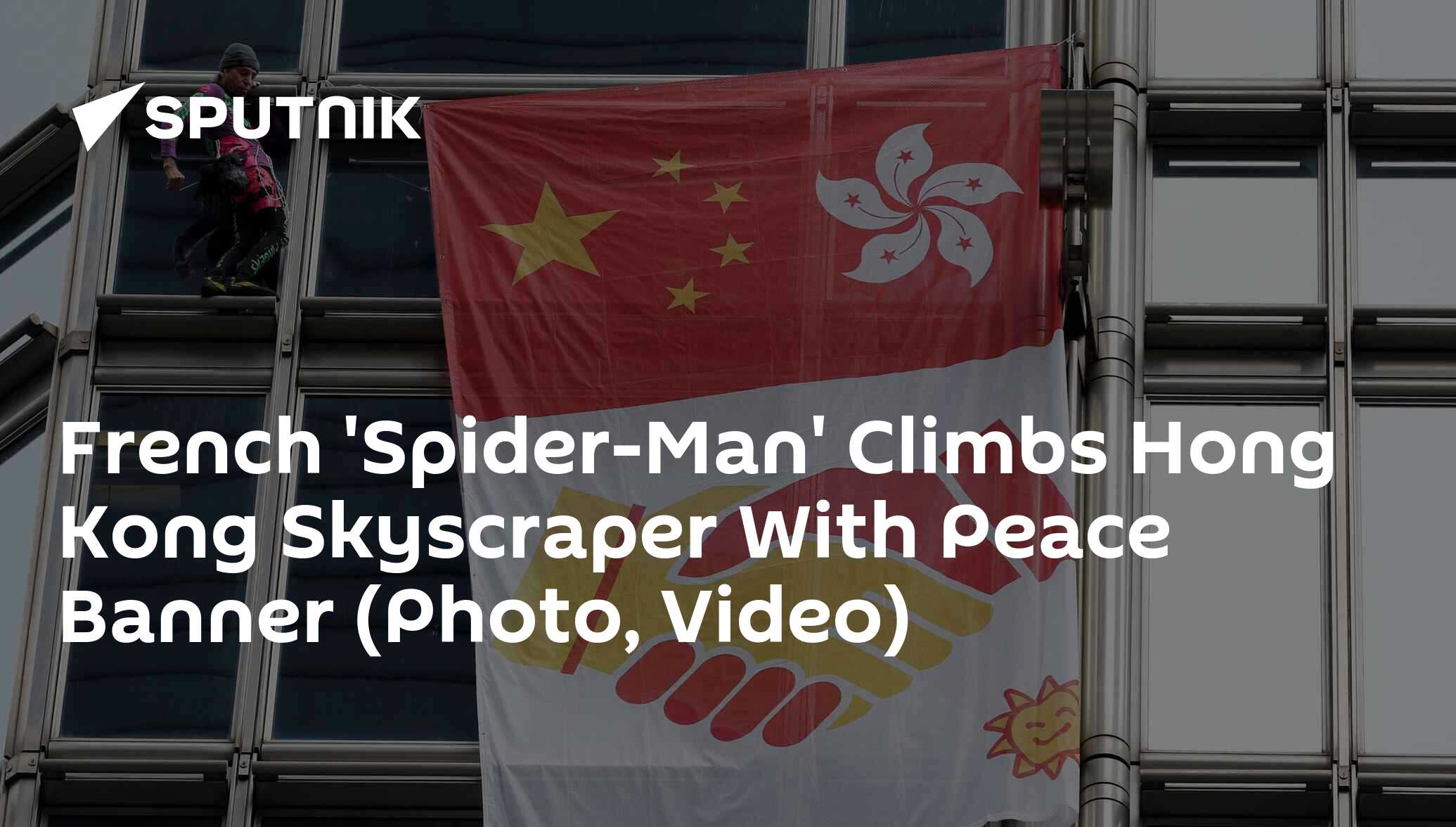 French 'Spider-Man' Climbs Hong Kong Skyscraper With Peace Banner ...
