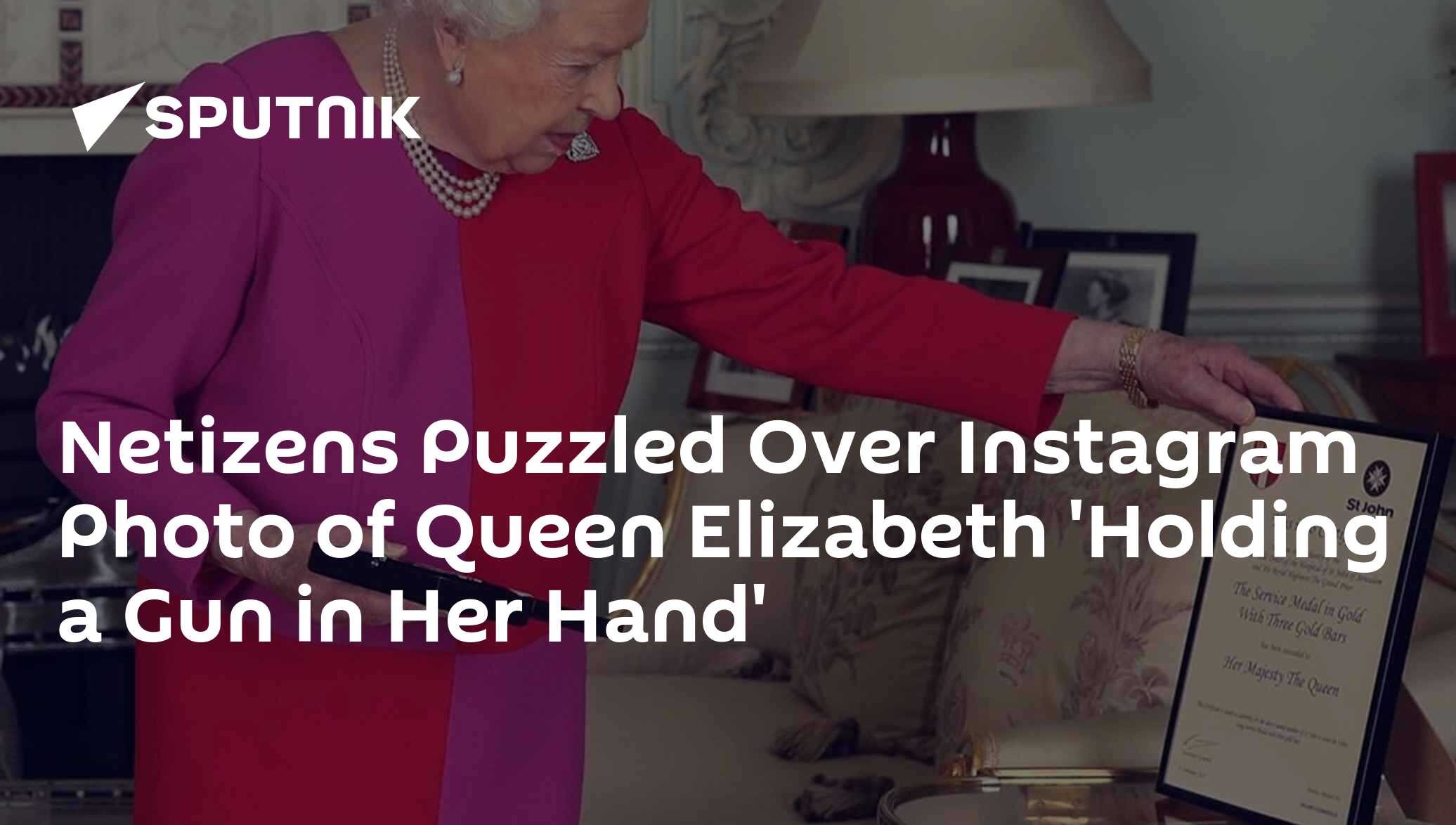 Netizens Puzzled Over Instagram Photo of Queen Elizabeth 'Holding a Gun ...