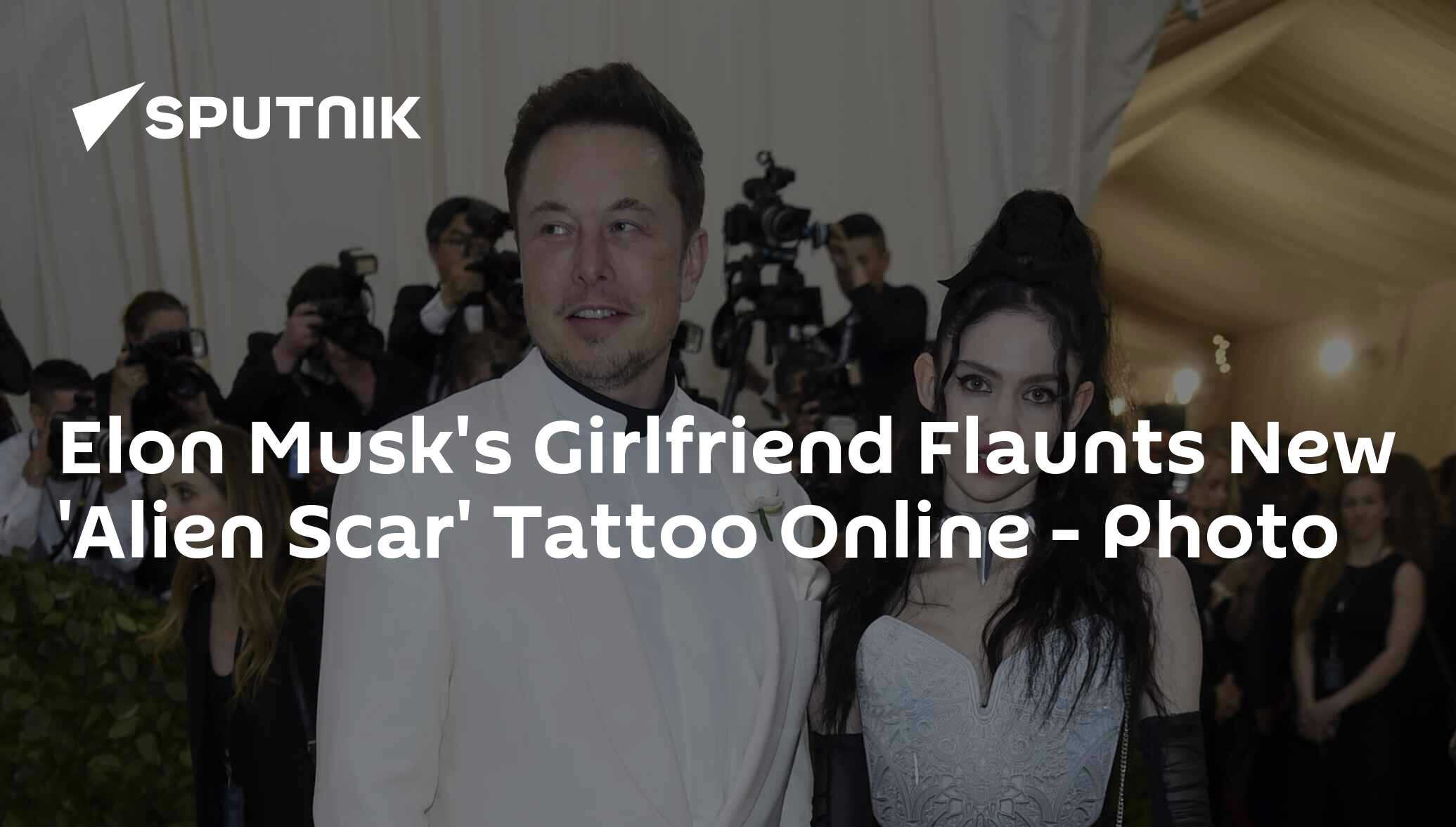 Elon Musk's Girlfriend Flaunts New 'Alien Scar' Tattoo Online - Photo