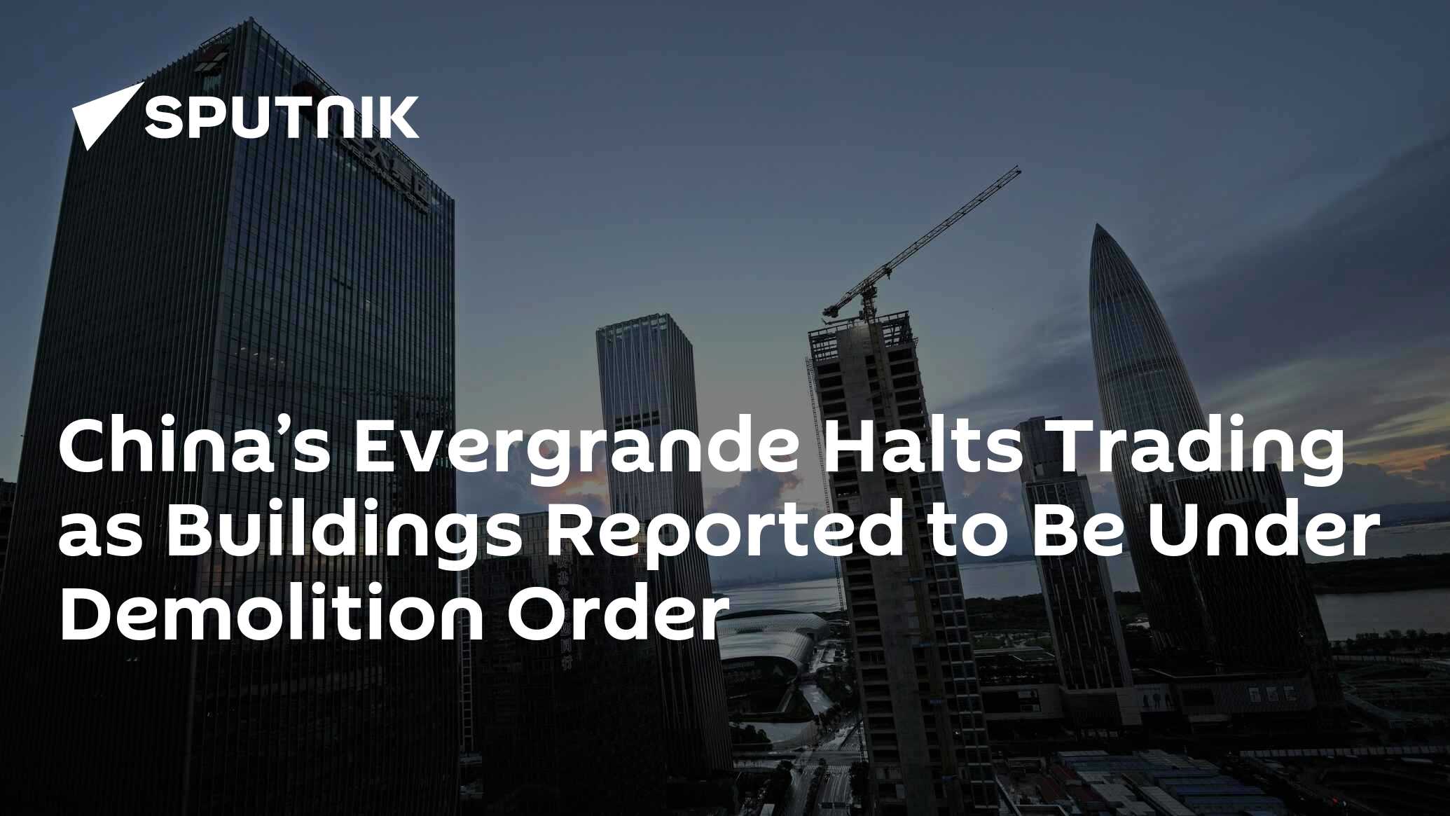China’s Evergrande Halts Trading as Buildings Reported to Be Under ...