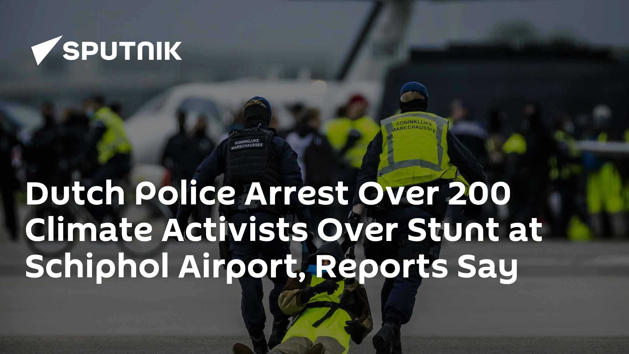 Dutch Police Arrest Over 200 Climate Activists Over Stunt at Schiphol ...