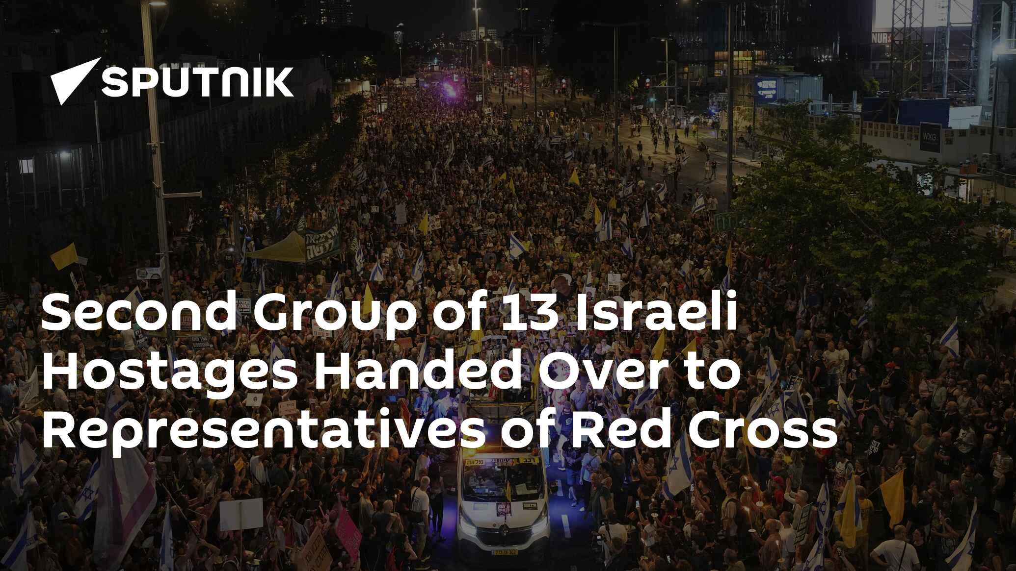 Second Group of 13 Israeli Hostages Handed Over to Representatives of ...