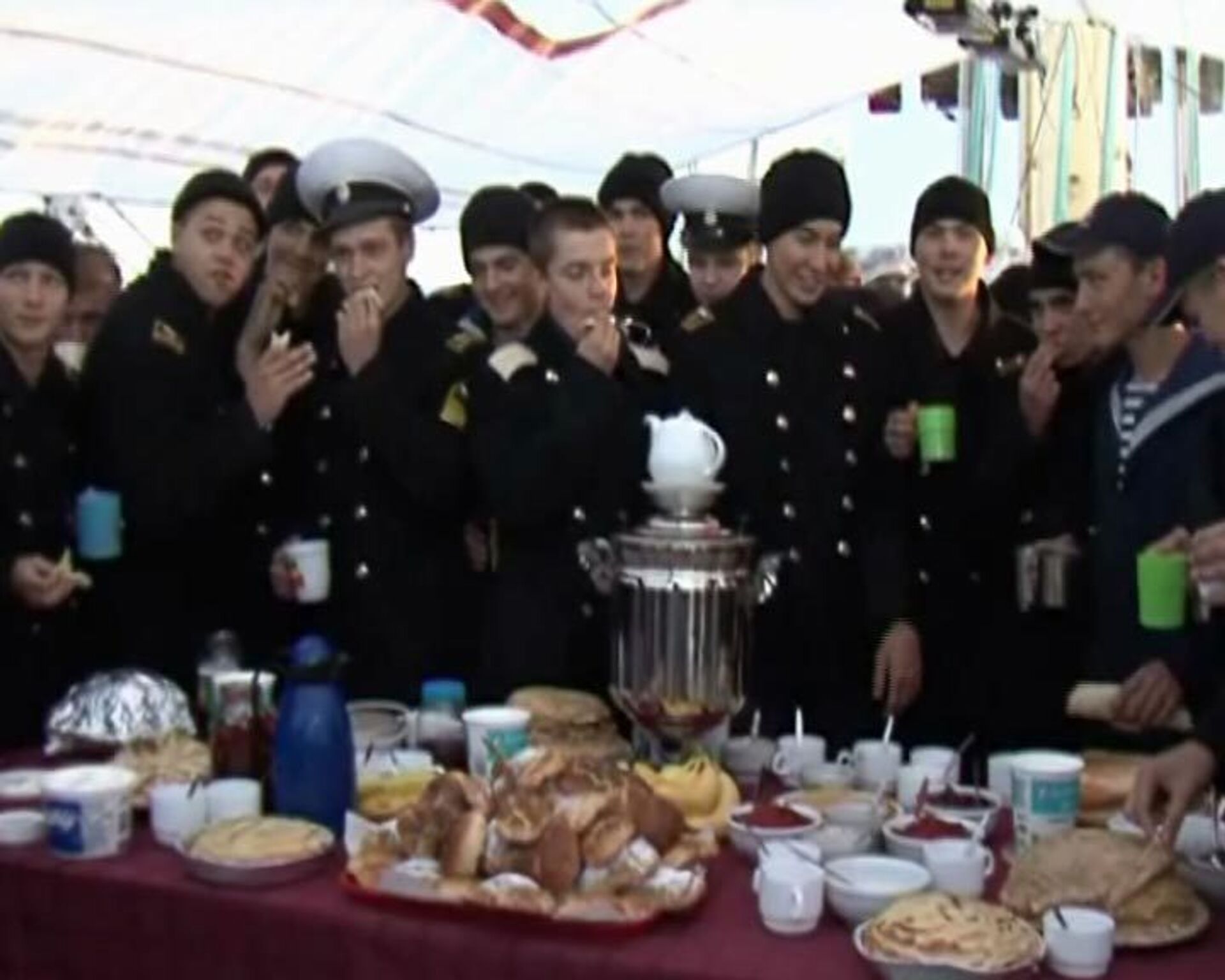 Canadian women serve Russian Krusenstern crew with pancakes on Russian ...
